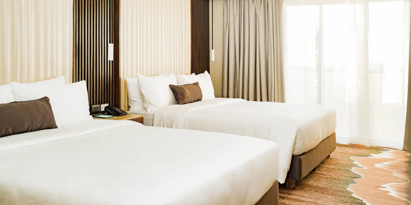 Rooms - Roy's Hotel and Convention Center